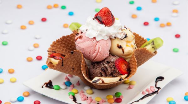 Ice Cream Sundae With Sprinkles And Toppings